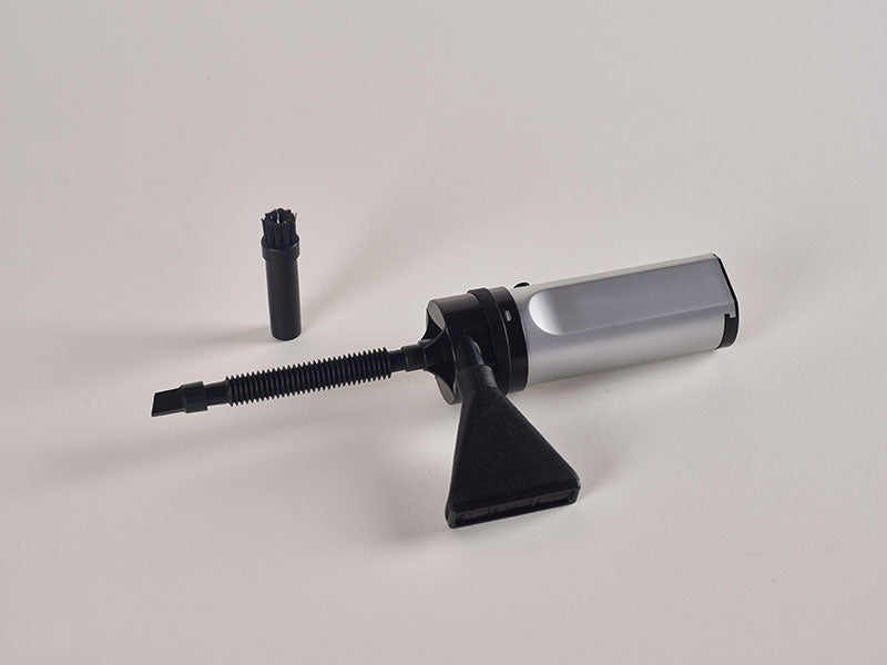 Mini-Vac with 2 brush attachments. Batteries included – Archival Survival